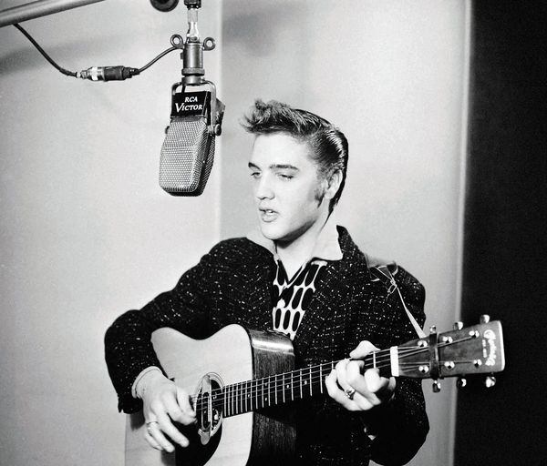 Elvis Presley recording in an RCA Victor studio in 1956.